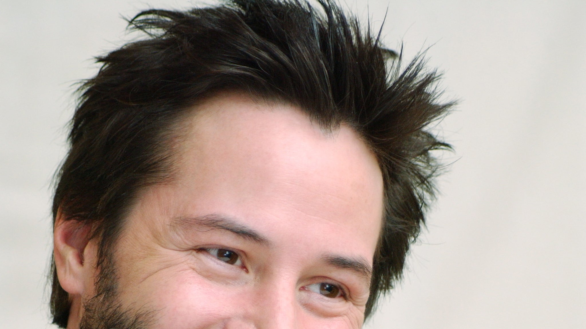 Keanu Reeves Happy and Smiling Through the Years