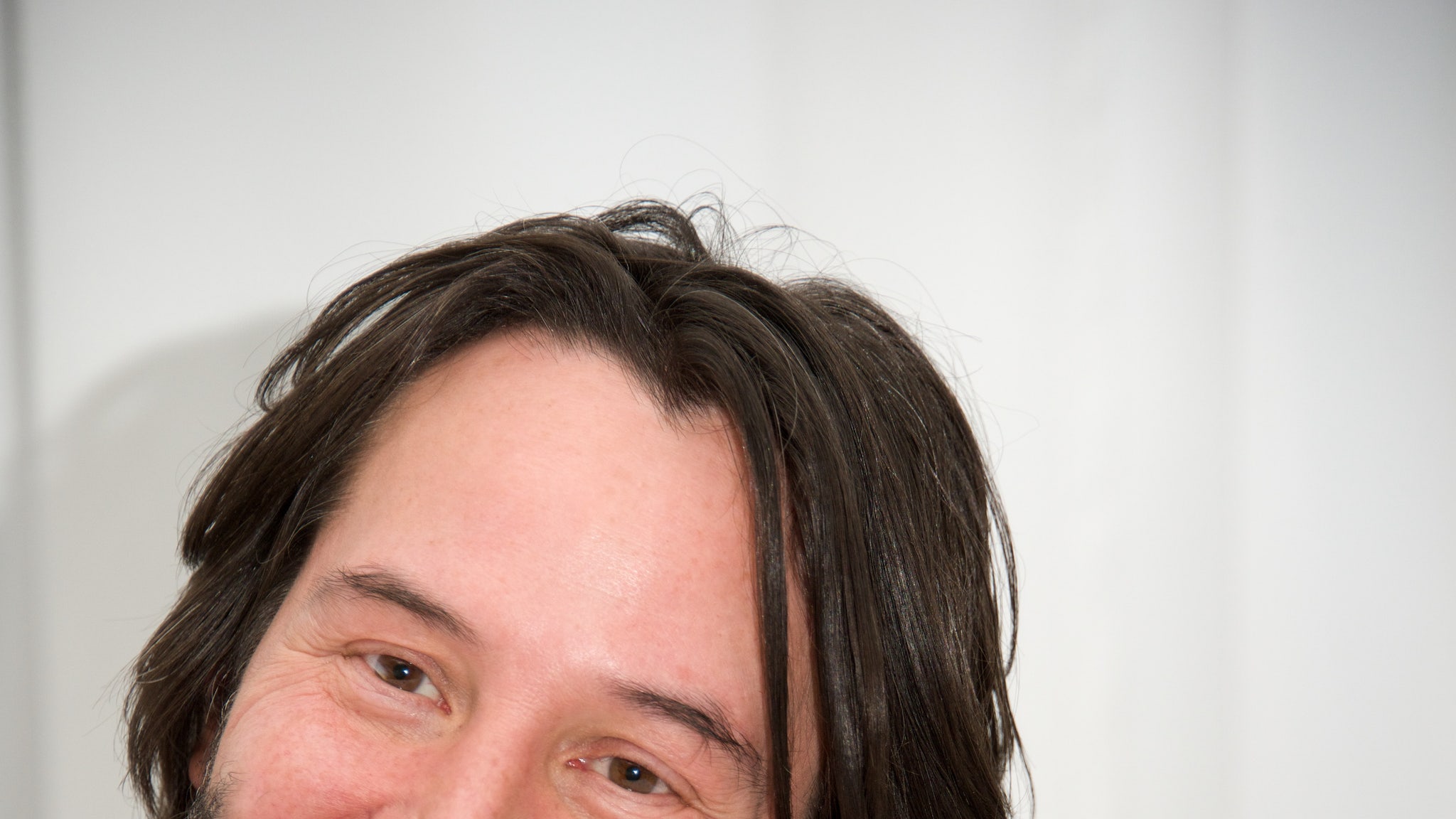 Keanu Reeves Happy and Smiling Through the Years